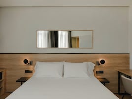 Quarto Duplo | Edredões de penas, minibar, cofre no quarto, ferro/tábua de engomar