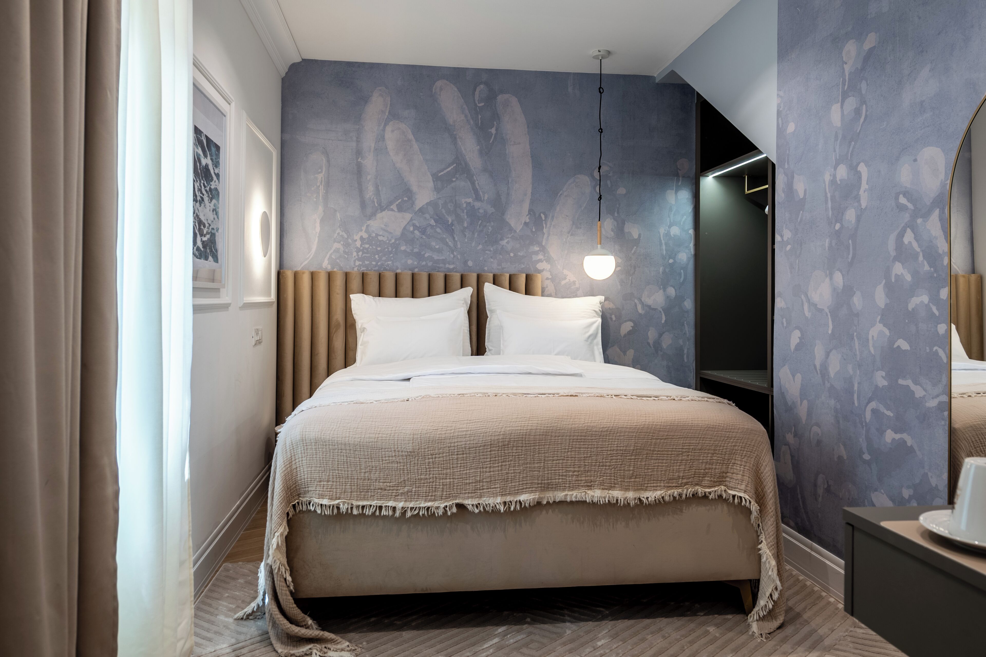 Quarto Quádruplo Deluxe, vista para o pátio | Interior