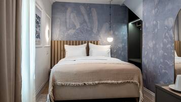 Quarto Quádruplo Deluxe, vista para o pátio | Interior
