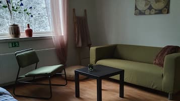 Apartamento, vista para o jardim | Área de estar