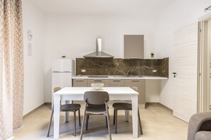 Apartamento, sacada | Cozinha privada