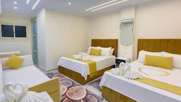 Quarto Quádruplo Familiar | Quartos insonorizados, Wi-fi grátis, roupa de cama fornecida