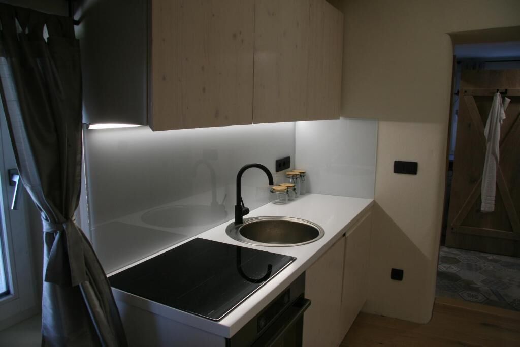 Apartamento Standard, pátio, vista para o jardim | Cozinha privada