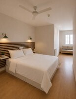 Suíte | Escrivaninha, Wi-Fi de cortesia, roupa de cama