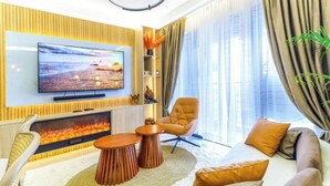Apartamento Deluxe | Sala de estar