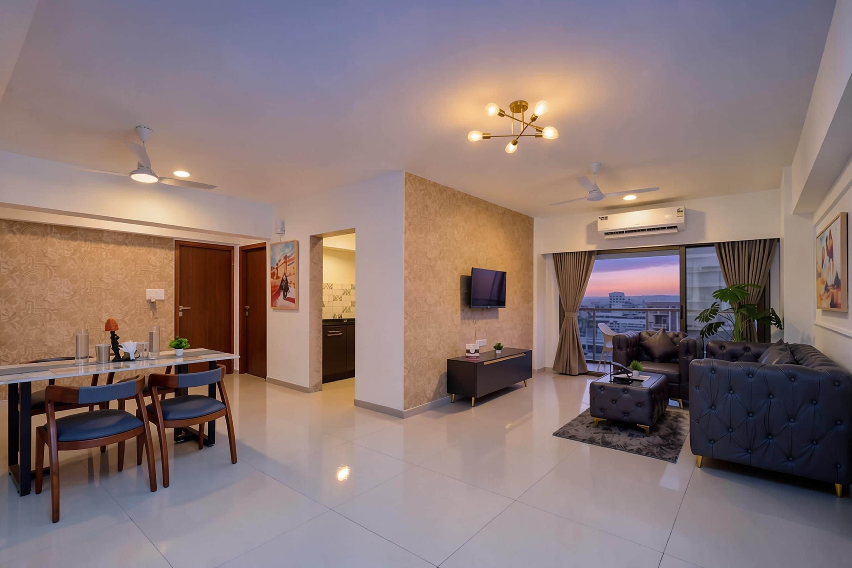 Apartamento família, vista para a cidade | Área de estar | TV LED