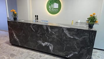 Suíte superluxo, vista para a cidade | Saguão