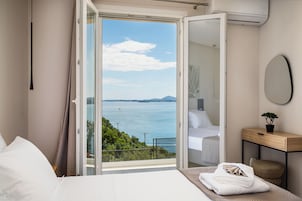 Casa, 2 quartos, terraço, vista para o mar | Ferro/tábua de engomar, Wi-fi grátis
