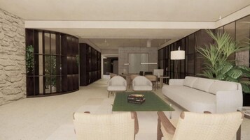 Uma sala de estar moderna com um sofá, cadeiras, uma mesa de centro e uma estante.