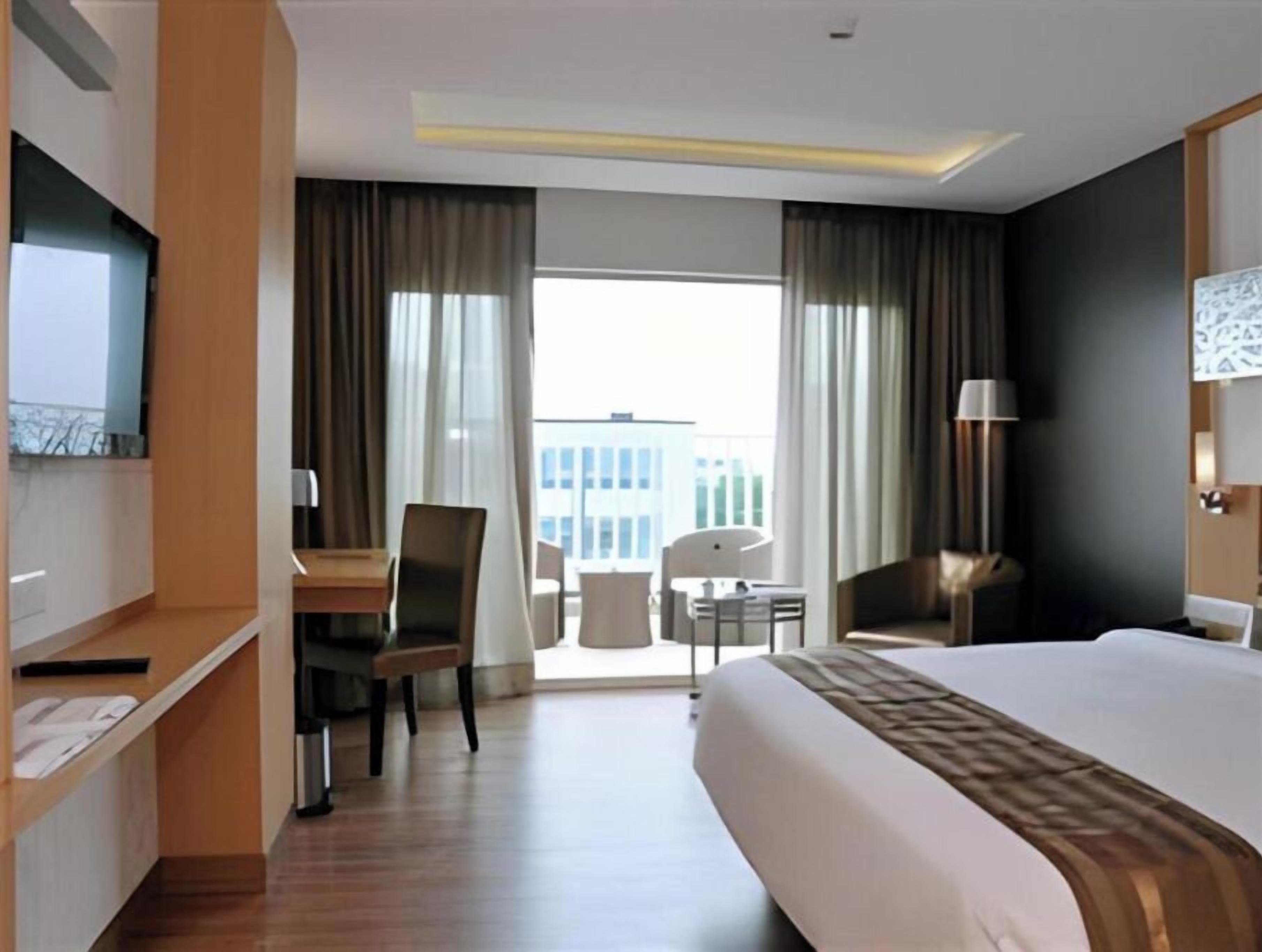 Quarto casal luxo, vista para a cidade