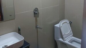 Quarto casal luxo de uso individual | Banheiro