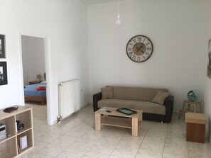 Apartamento, vista para o pátio | Área de estar