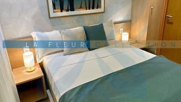 Apartamento superluxo | Roupas de cama premium, camas com colchões pillow-top, frigobar