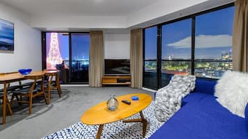 Apartamento Deluxe, varanda, Vista para a cidade | Sala de estar