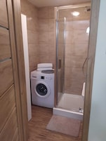 Apartamento conforto, sacada | Banheiro