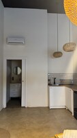 Suite Xocolate | Sala de estar | Smart TV de 40 polegadas com canais por cabo 