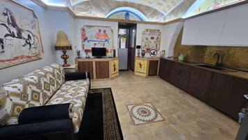 Apartamento Deluxe | Sala de estar