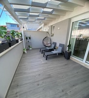 Quarto casal luxo, vista para a cidade | Terraço/pátio