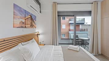 Quarto Duplo Deluxe, Vista para a cidade | Roupa de alta qualidade, secretária