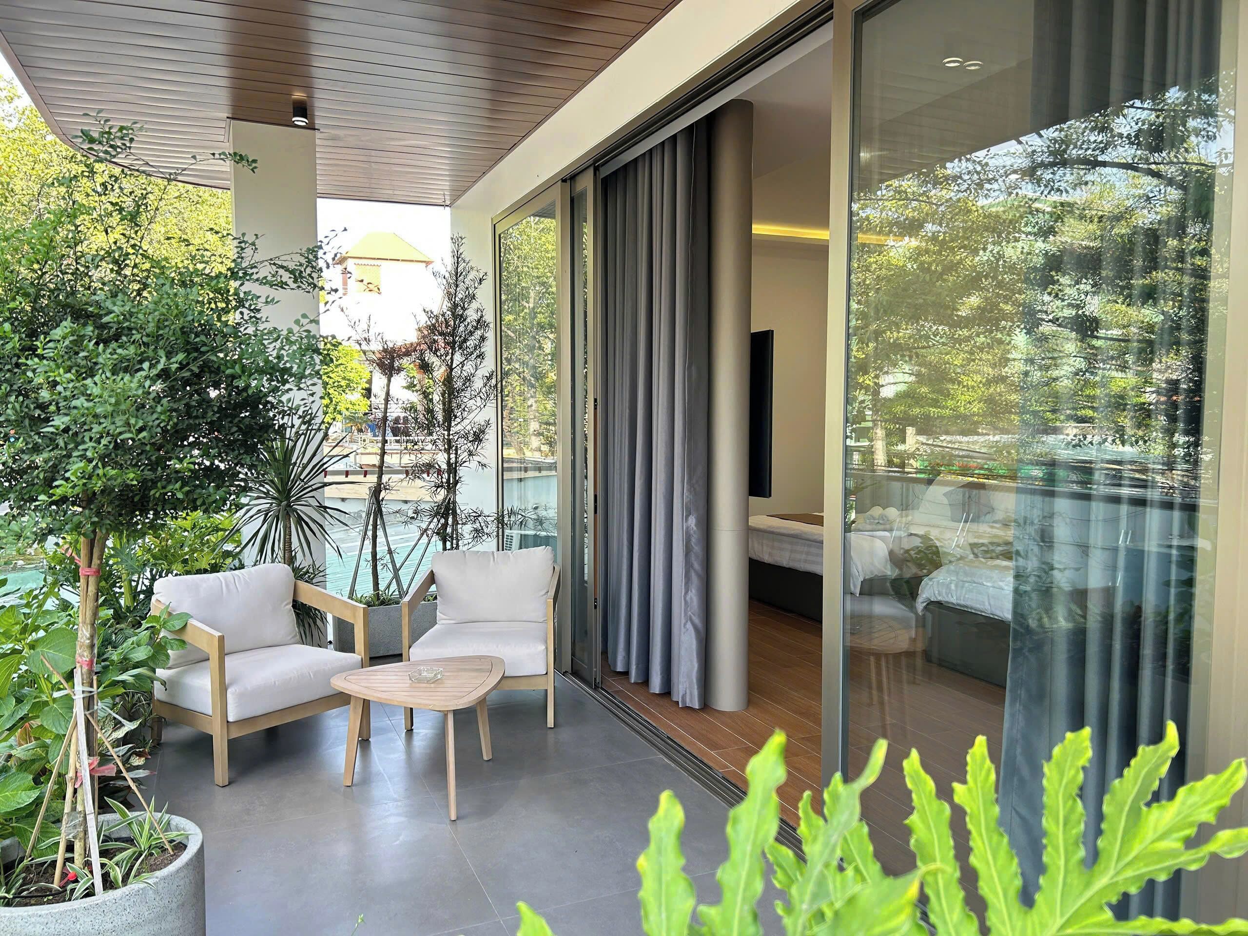 Quarto Quádruplo Deluxe, varanda | Terraço/pátio interior