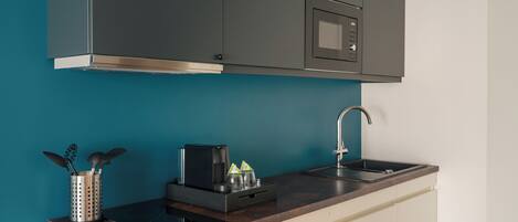 Apartamento conforto | Cozinha privada | Geladeira, micro-ondas, cooktop, lava-louças