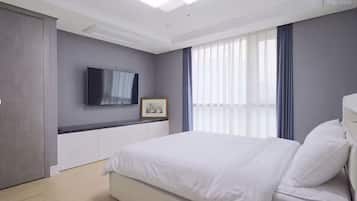 Suite Familiar, não fumadores, Vista para a cidade | Wi-fi grátis, roupa de cama fornecida, acesso para cadeira de rodas