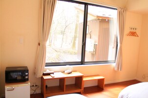 Quarto Twin Deluxe, vista para o jardim
