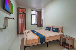 Quarto superior | Wi-Fi de cortesia, roupa de cama