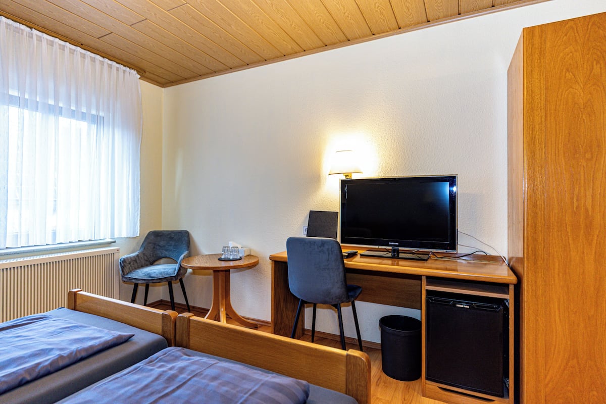 Quarto Duplo Comfort | Minibar, secretária, Wi-fi grátis, roupa de cama fornecida