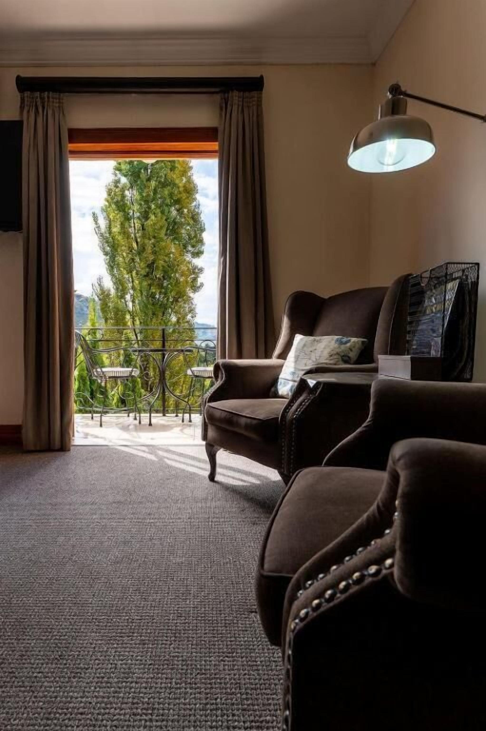 Quarto Deluxe, varanda, Vista para a cidade | Sala de estar