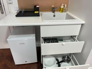Quarto Triplo Deluxe | Cozinha privada