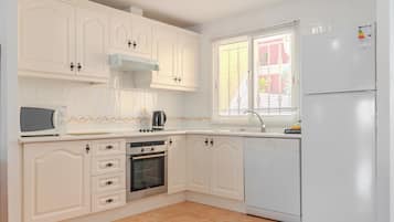 Apartamento, 2 quartos, sacada, vista para o jardim | Parte interna