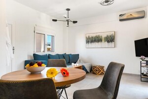 Apartamento Deluxe, vista parcial para o mar | Restaurantes