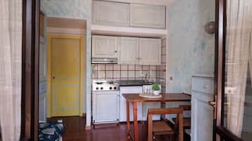 Apartamento | Cozinha privada | Uma chaleira elétrica