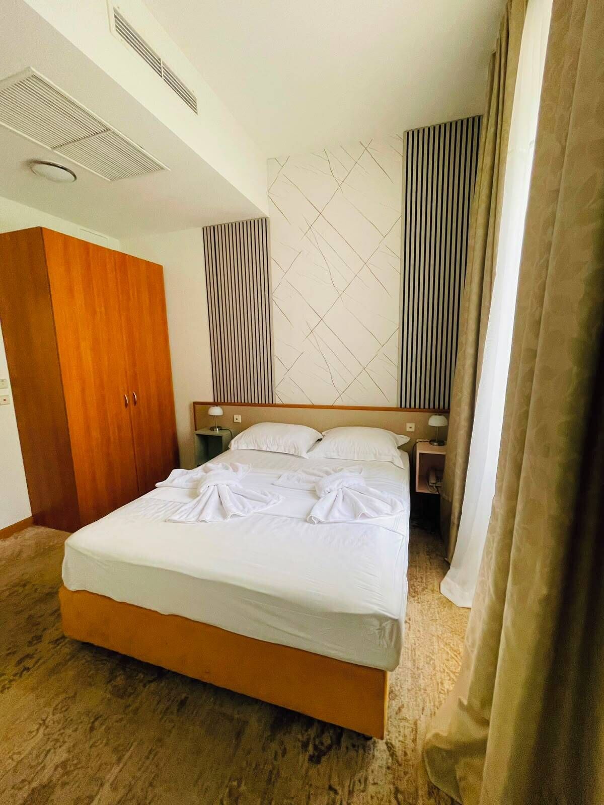 Quarto casal, vista para o jardim | Wi-Fi de cortesia, roupa de cama