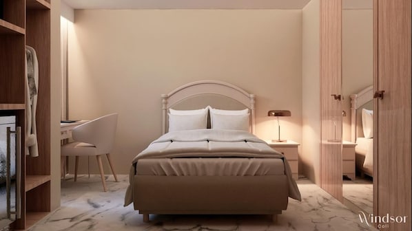 Um quarto com uma cama, uma escrivaninha e uma cadeira.