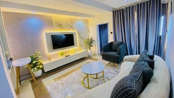 Apartamento Deluxe | Sala de estar