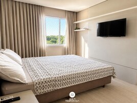 Apartamento premium, acesso à piscina, vista para a praia | 1 quarto, roupas de cama premium, Wi-Fi de cortesia