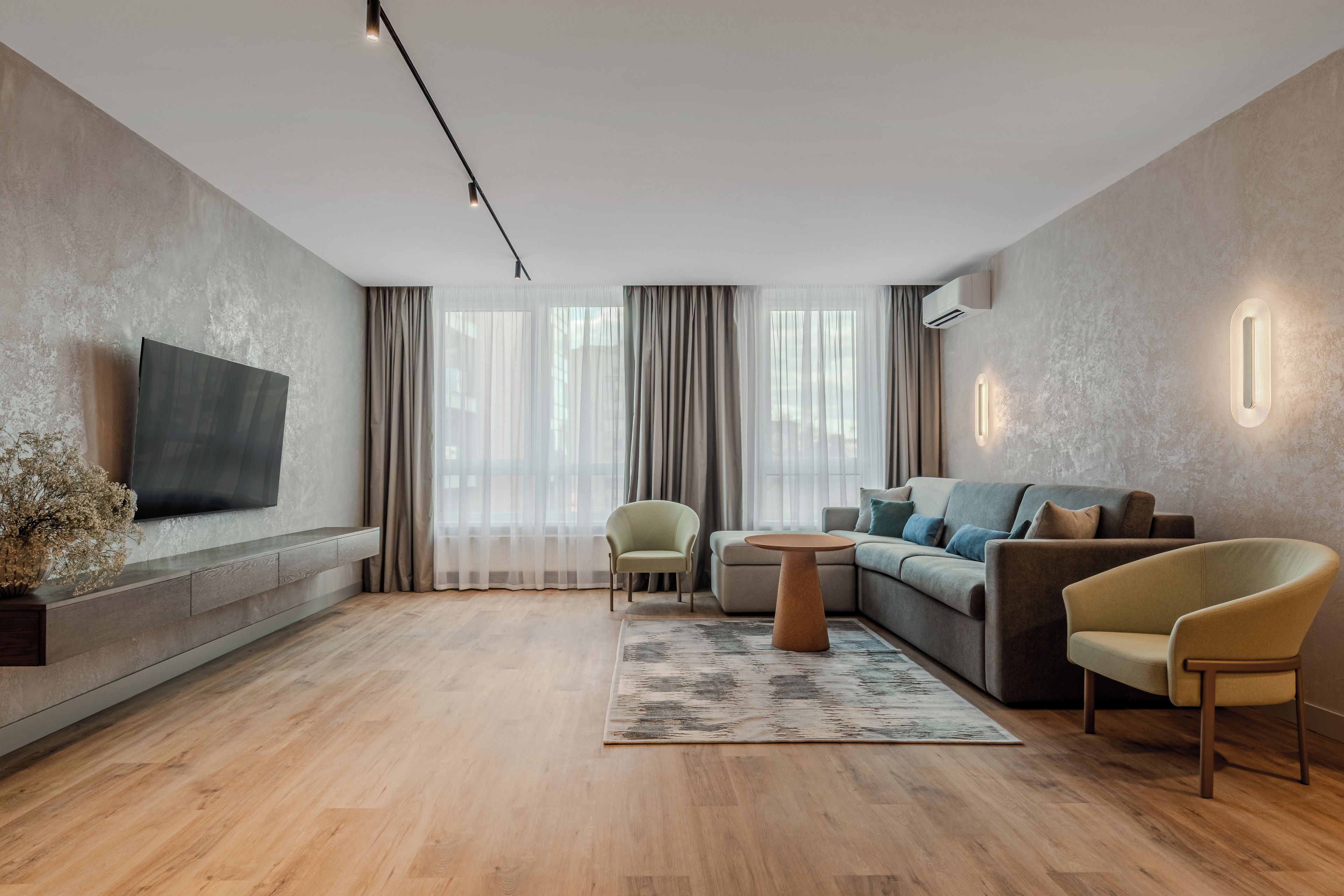 Suite Executiva, 2 quartos | Sala de estar | Smart TV de 55 polegadas com canais digitais 