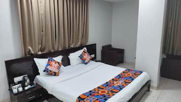 Quarto standard, vista para a cidade | Wi-Fi de cortesia, roupa de cama