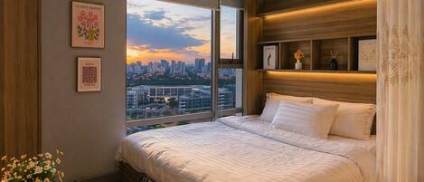 Suíte estúdio, 1 cama Queen e sofá-cama, vista para a cidade | Escrivaninha, espaço de trabalho para notebook, cortinas blackout