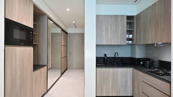 Apartamento, varanda | Cozinha privada