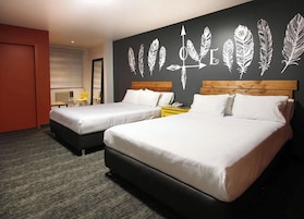 Quarto casal standard, vista para a cidade