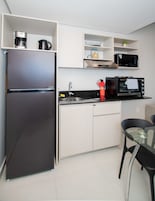 Apartamento, vista para a cidade | Cozinha privada