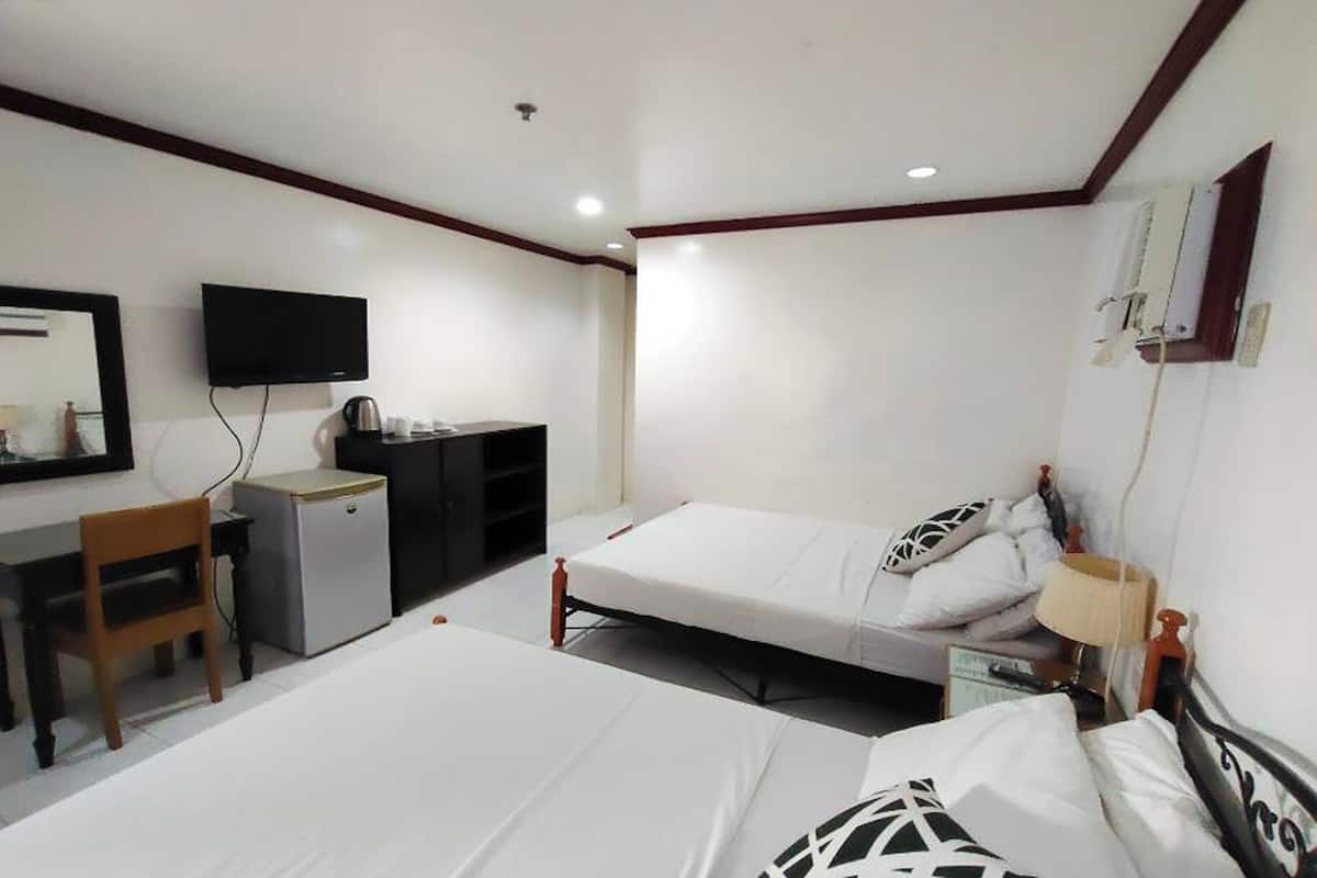 Quarto família | Cofres nos quartos, escrivaninha, Wi-Fi de cortesia, roupa de cama