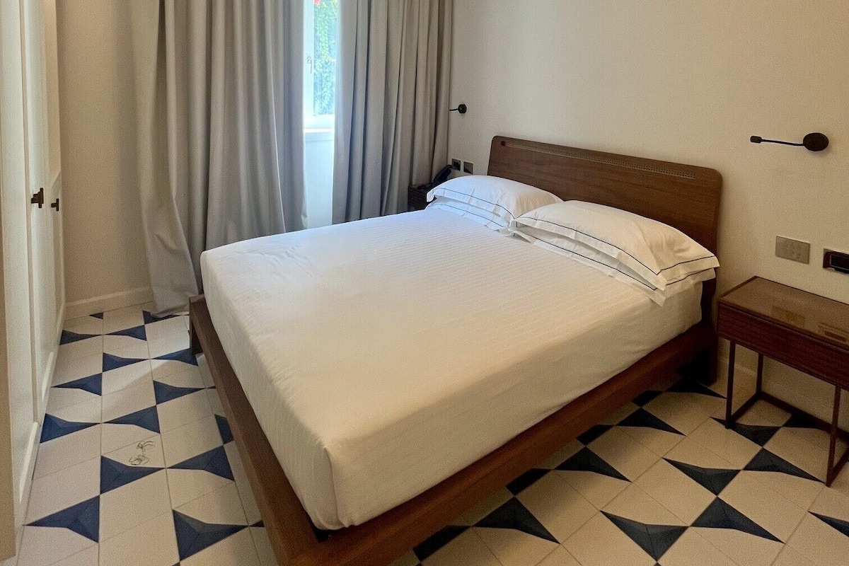 Quarto Duplo Standard | Roupa de alta qualidade, minibar, cofre no quarto