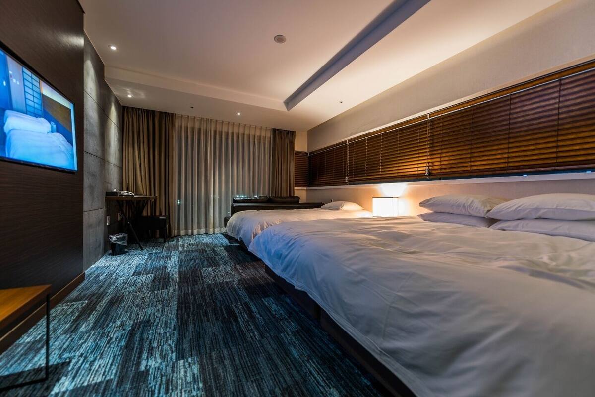 Quarto Premium, varanda, vista para o mar | Edredões de penas, secretária, Wi-fi grátis 