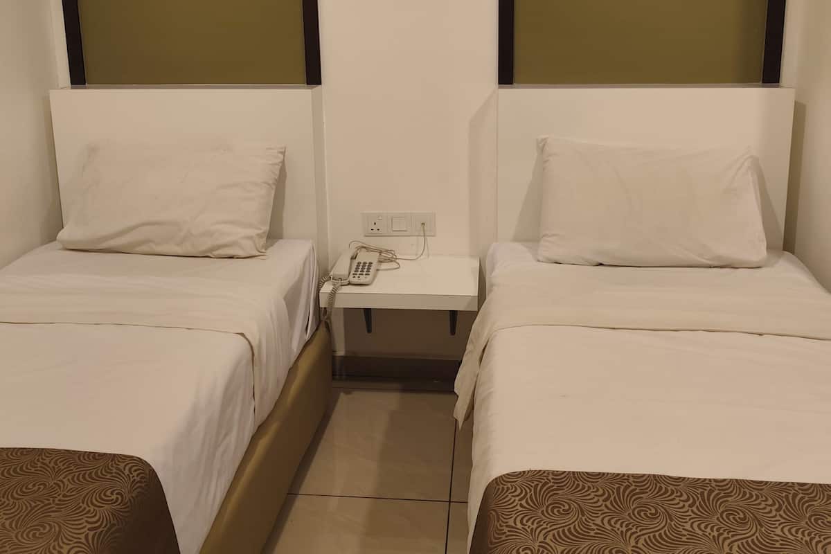 Quarto Twin Executivo, 2 camas individuais | Wi-fi grátis