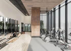 Uma academia moderna com equipamentos de ginástica, janelas amplas e design minimalista.
