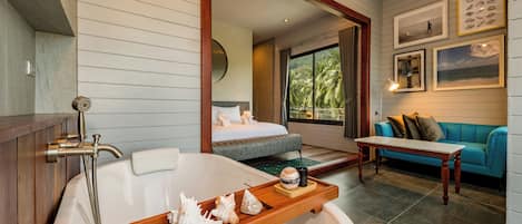 Suíte superior, vista para o mar | Cofres nos quartos, escrivaninha, Wi-Fi de cortesia, roupa de cama